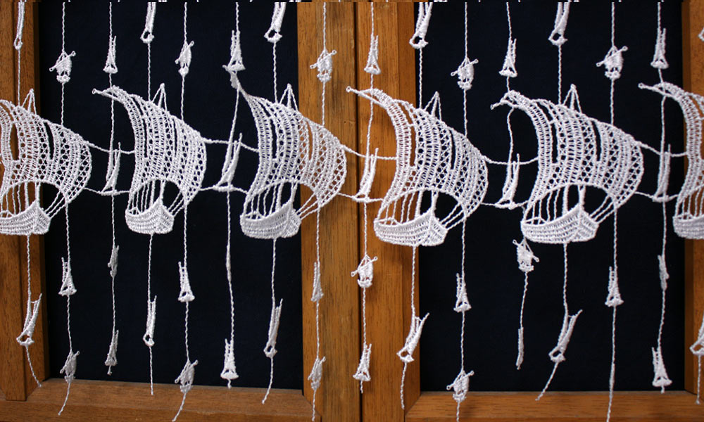 Rideau en macramé esprit mer avec galion